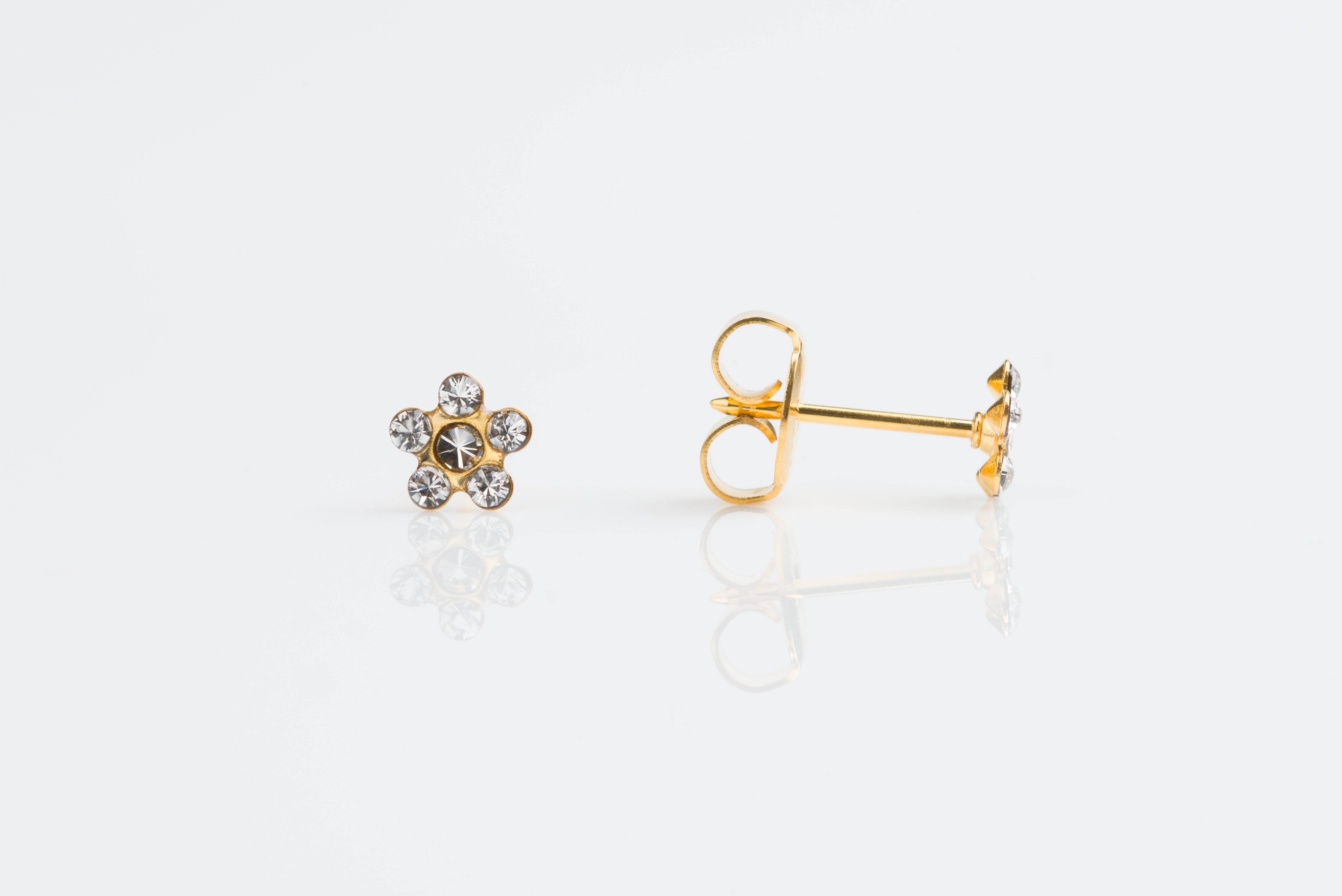 System 75 Daisy Birthstone Piercing Studs - Clear Crystal - Regular Po ...
